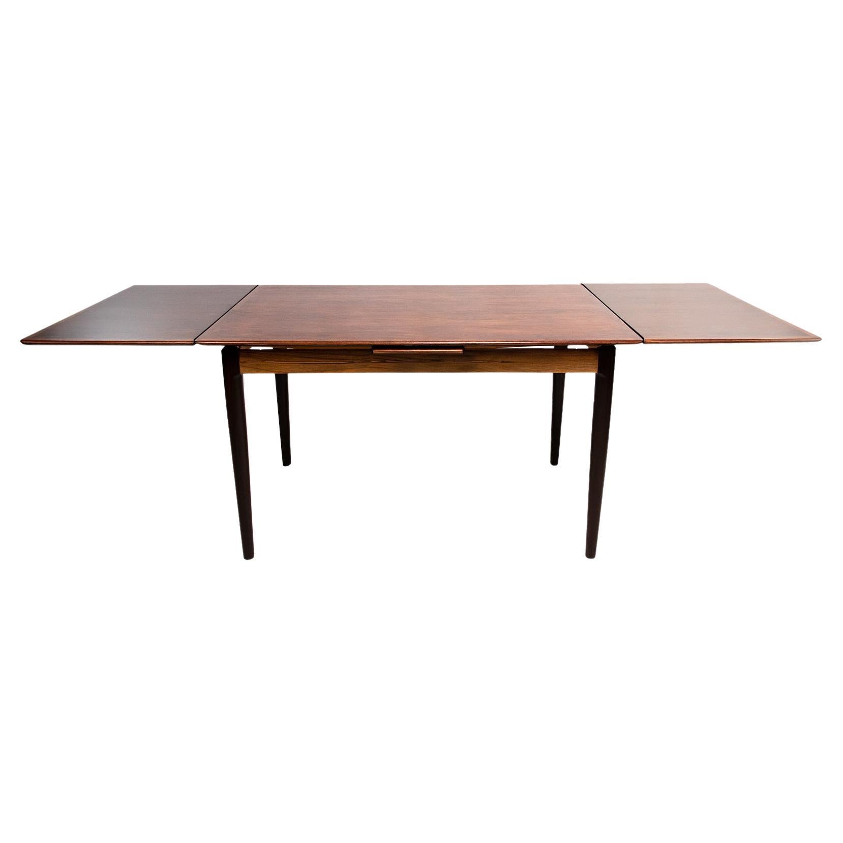 Rosewood round Danish mid century modern dining table at 1stDibs
