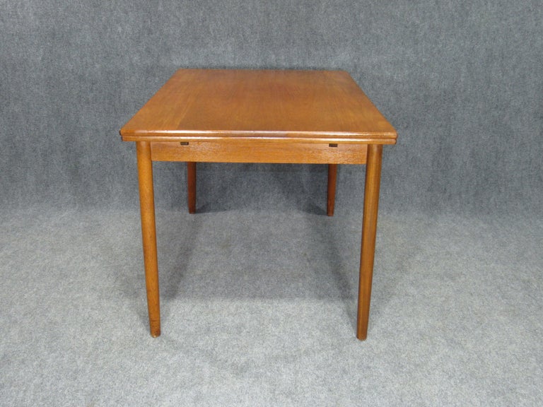 Danish Modern Teak Dining Table with Pull Out Leaves For Sale at 1stDibs