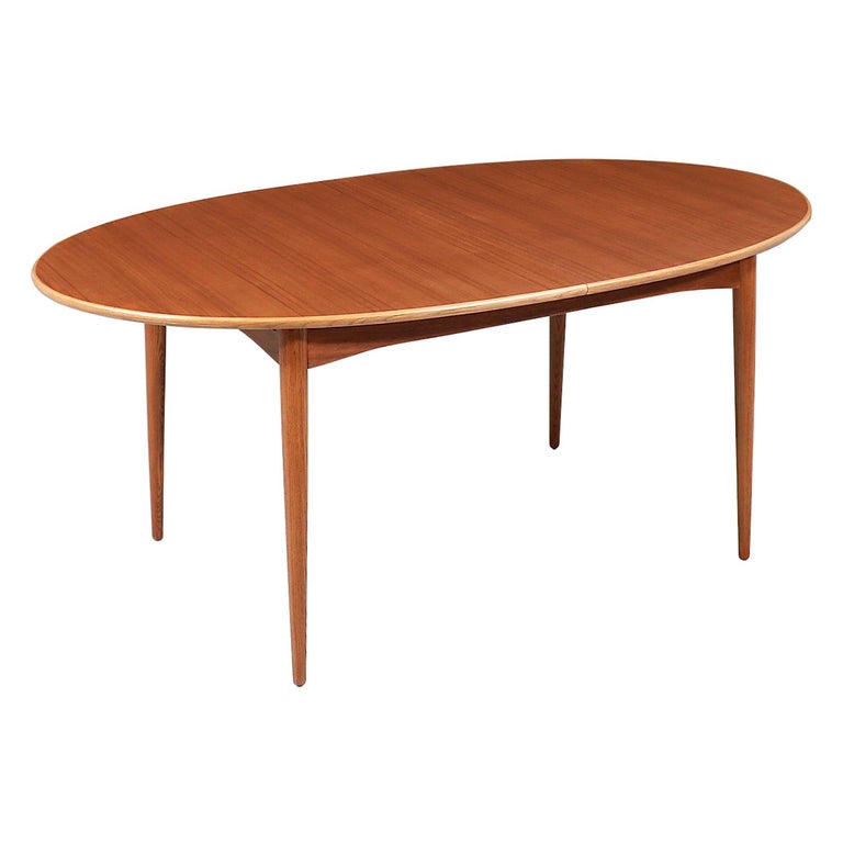 Danish Modern Teak and Oak Butterfly-Leaf Oval Dining Table at 1stDibs