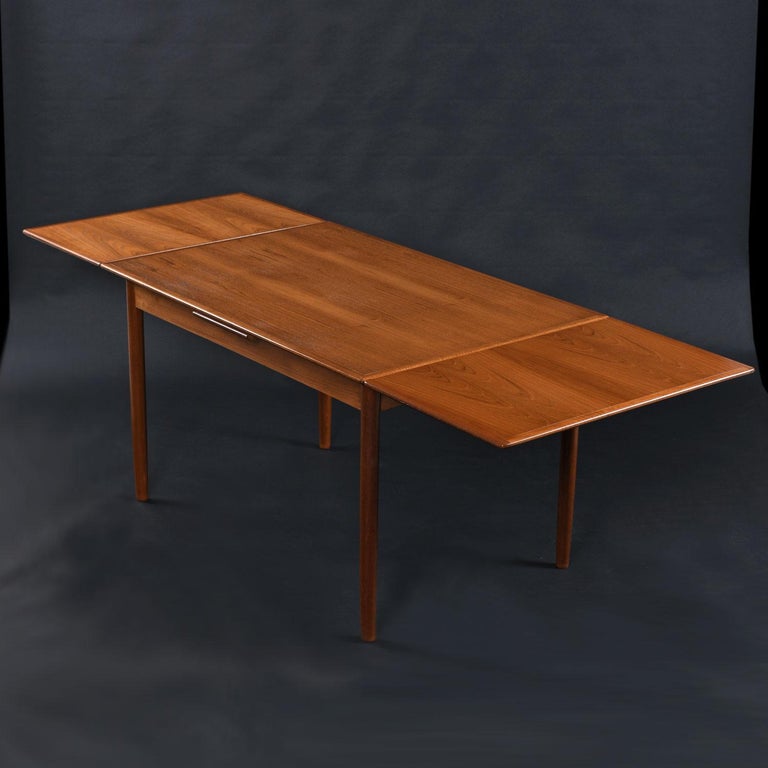 Danish Teak Draw Leaf Expanding Dining Table For Sale at 1stDibs