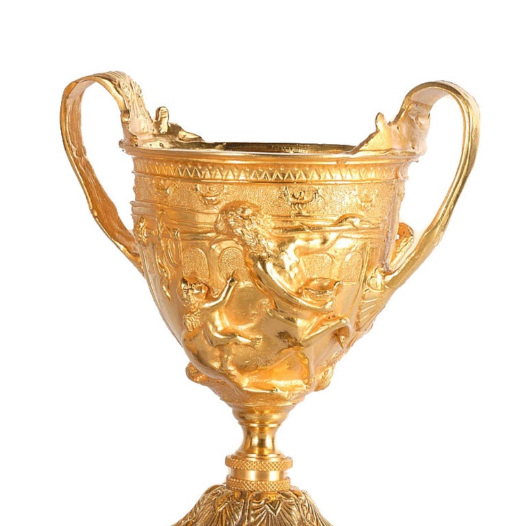 Hercules Satin brass cup with black marble base For Sale at 1stDibs