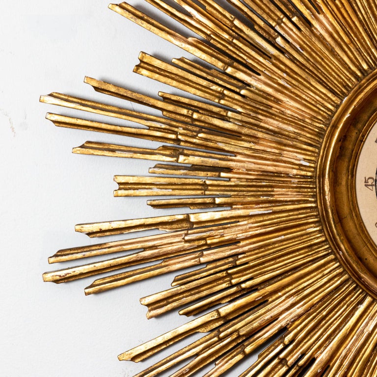 Decorative French Gilded Wood Sunburst Wall Clock For Sale at 1stDibs