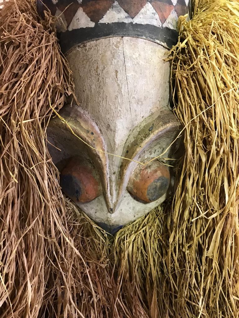 Decorative Large Adorned African Folk Art Mask with Horns on Display ...