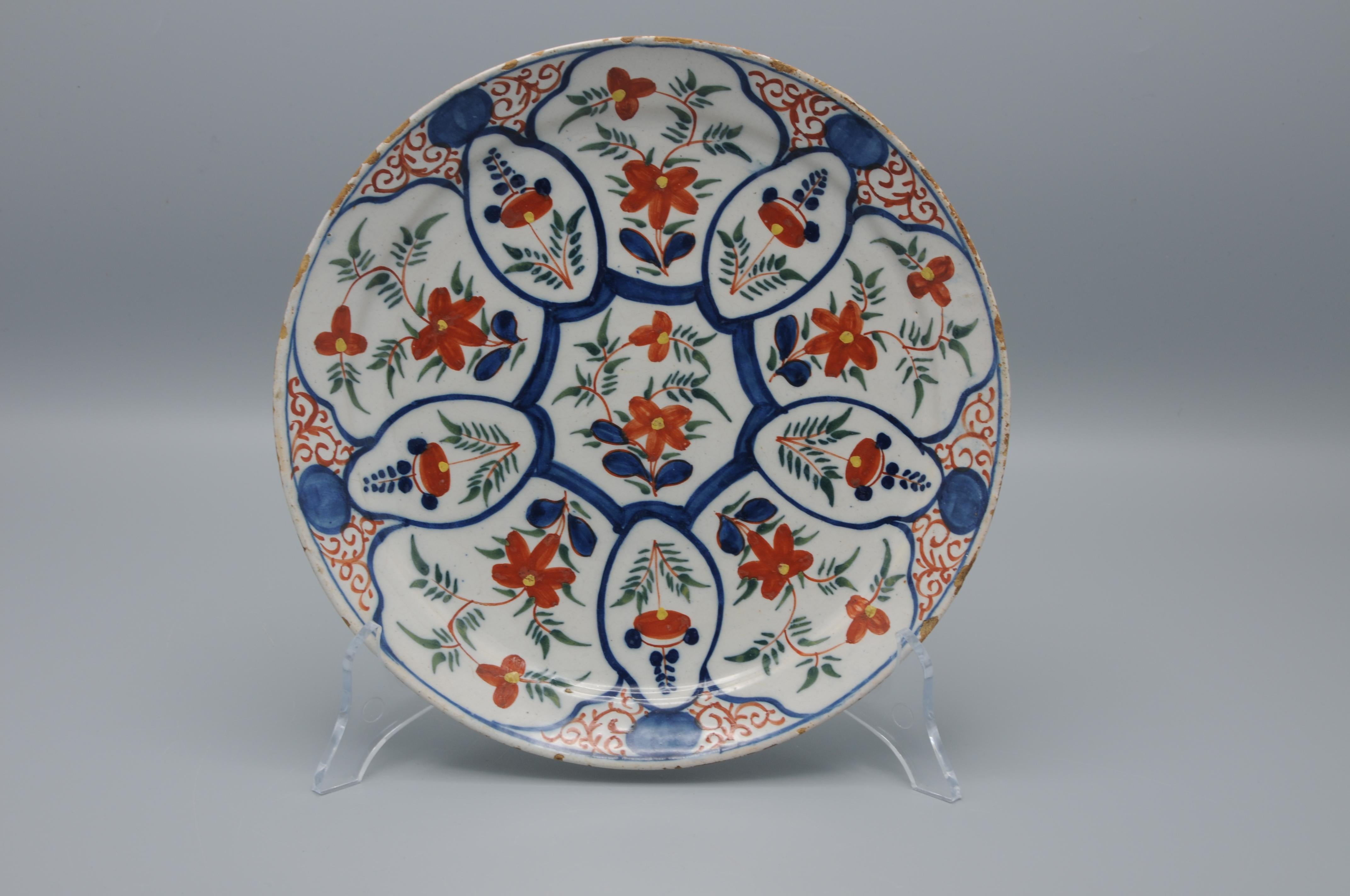 Delft polychrome plate with floral decor - 18th century For Sale at 1stDibs