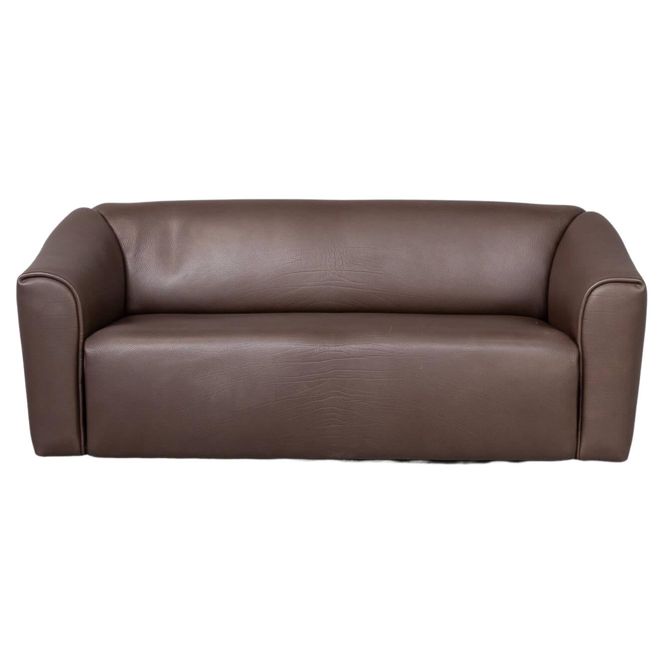 DeSede “DS47” leather two seat sofa and hocker For Sale at 1stDibs