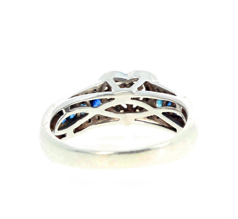 AJD Delicate Eye-Catching Diamond and Blue Sapphire Platinaire Ring at ...