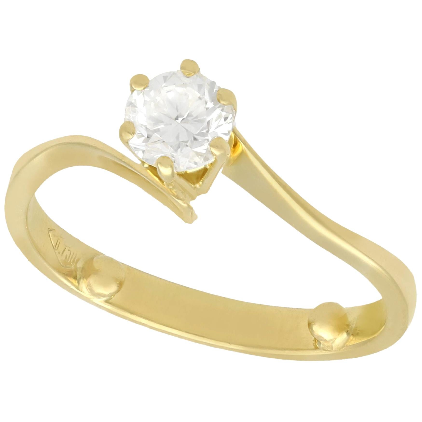 Diamond and Yellow Gold Twist Solitaire Engagement Ring For Sale at 1stDibs