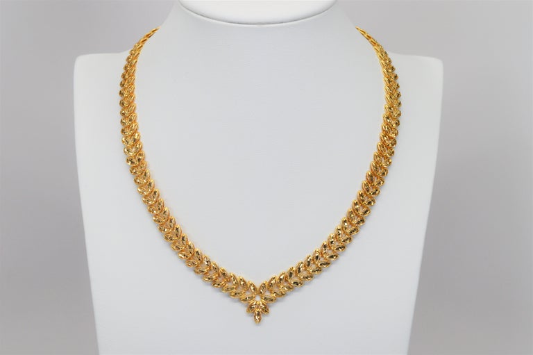 Diamond Cut 14 Karat Yellow Gold Chevron Leaf Portrait Necklace