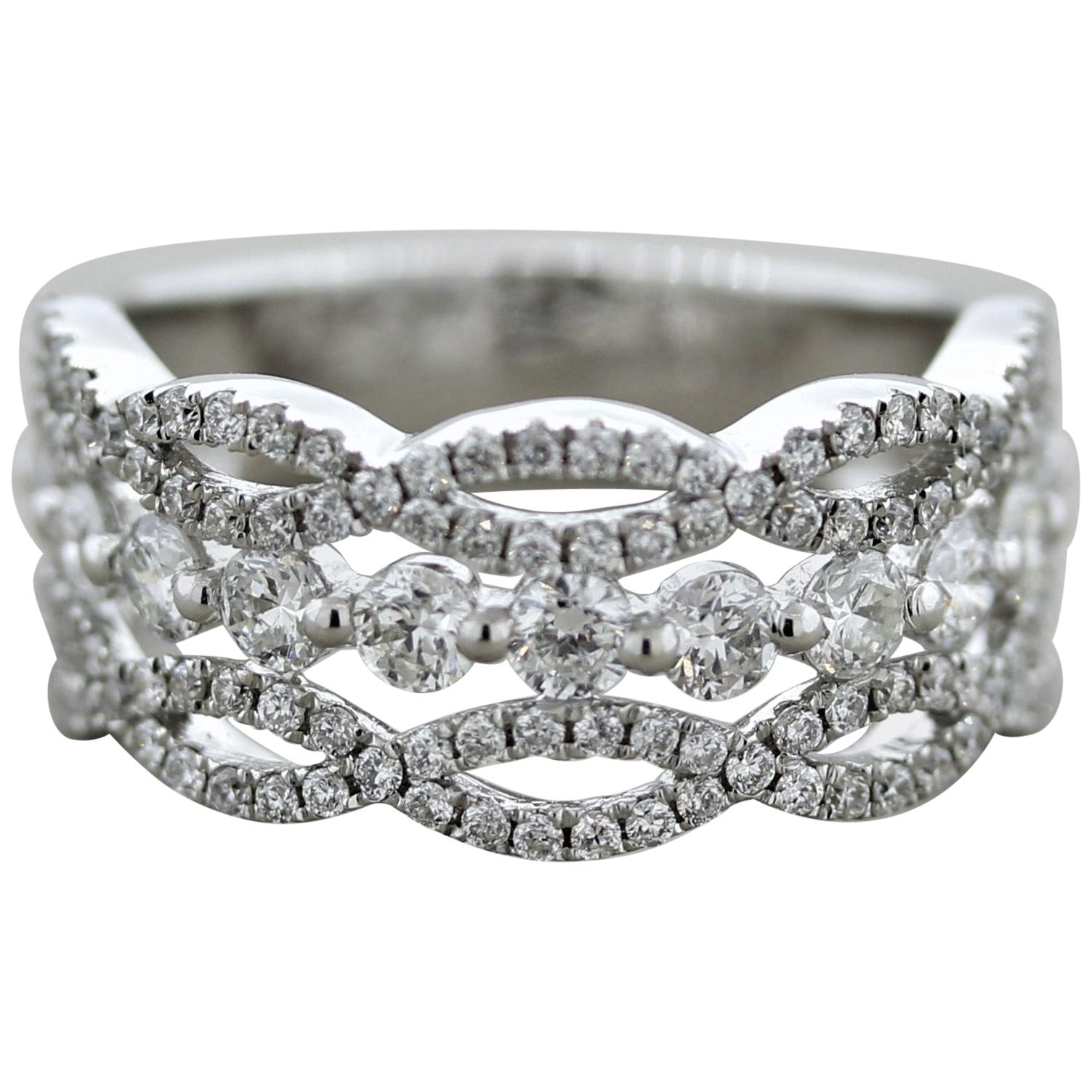 A Gold and Diamond Swirl Ring at 1stDibs