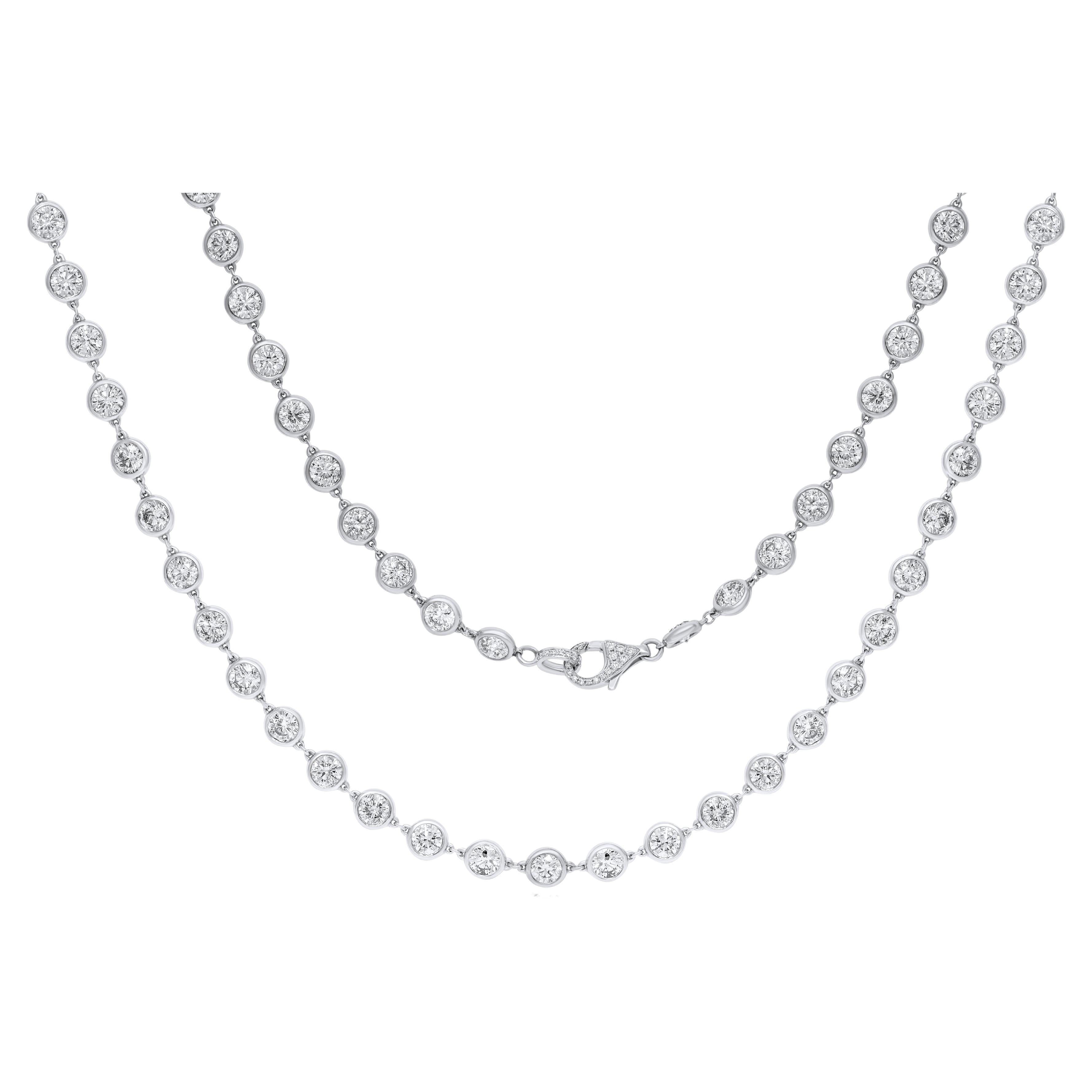 Diana M.18kt white gold long bezel set approximately 40.00cts diamond ...