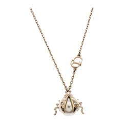Dior Crystal Faux Pearl Lady Bug Gold Tone Pendant Necklace For Sale at ...