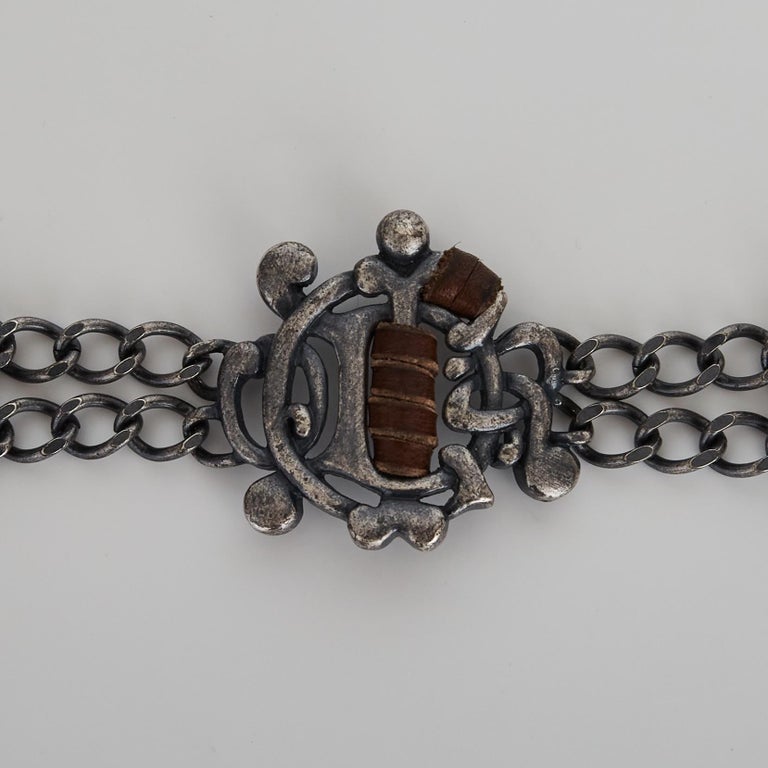 Dior Vintage Gun Metal Crest Logo Typographic Bracelet For Sale at 1stDibs