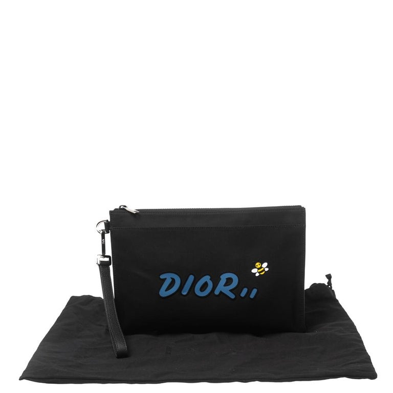 Dior x Kaws Black Nylon Bee Wristlet Pouch For Sale at 1stDibs