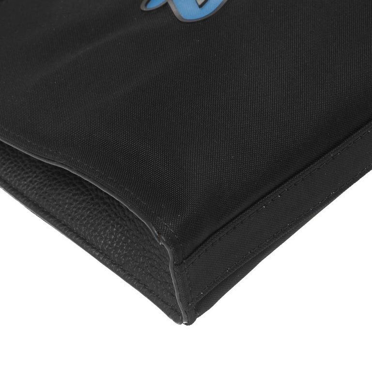 Dior x Kaws Black Nylon Bee Wristlet Pouch For Sale at 1stDibs