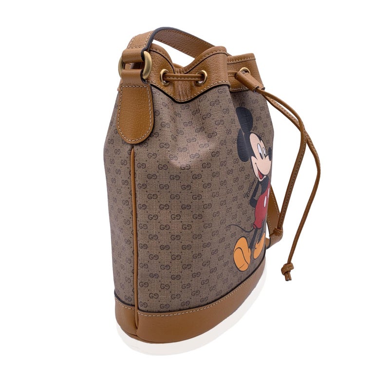 Disney x Gucci Mini GG Supreme Canvas Drawstring Bucket Bag For Sale at ...