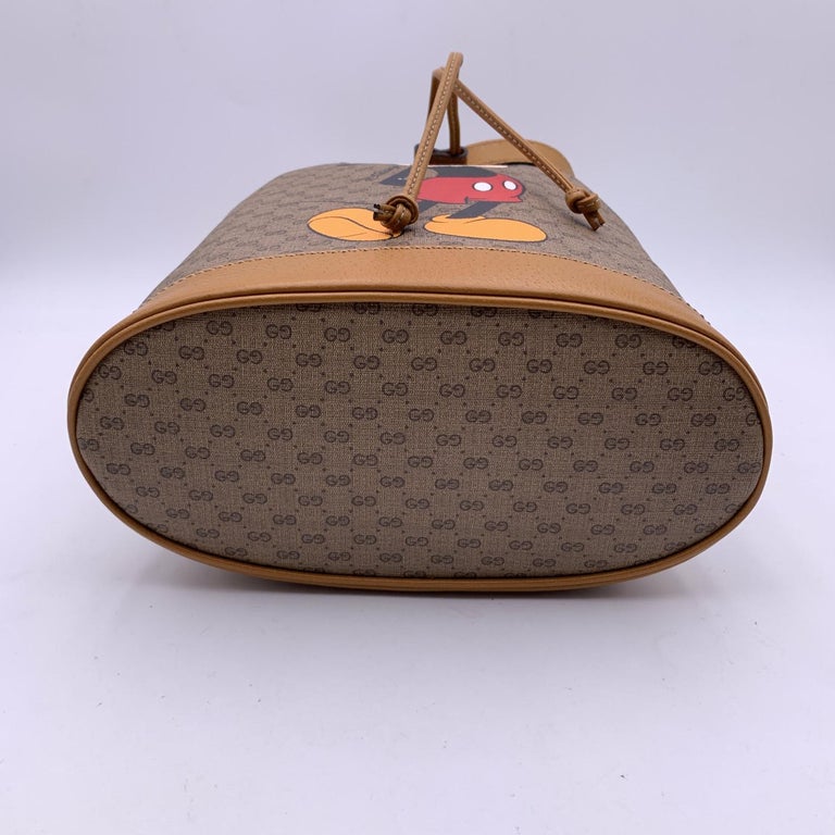 Disney x Gucci Mini GG Supreme Canvas Drawstring Bucket Bag For Sale at ...