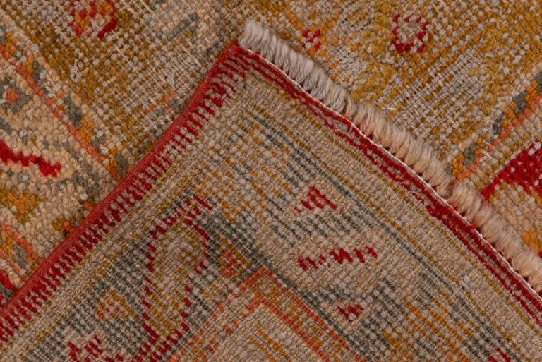 Distressed Antique Turkish Oushak Carpet, Red and Gold For Sale at 1stDibs