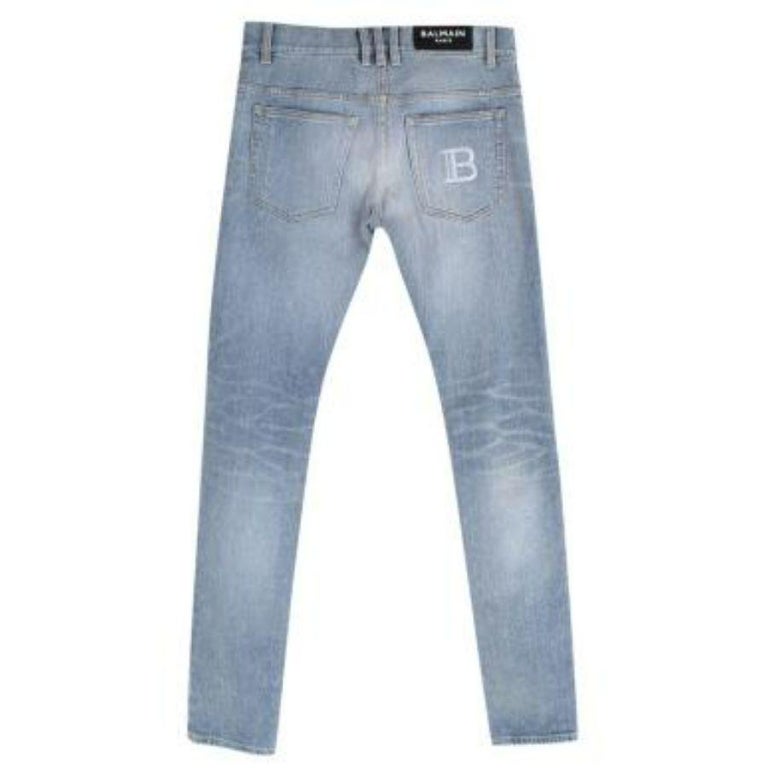 Distressed Light Blue Slim Jeans For Sale at 1stDibs