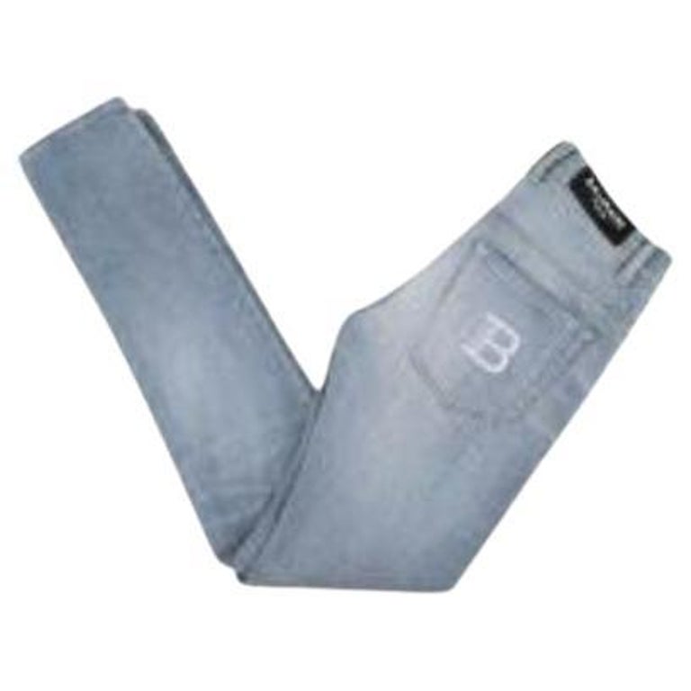 Distressed Light Blue Slim Jeans For Sale at 1stDibs