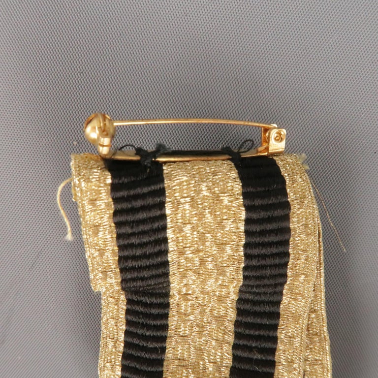 DSQUARED2 Black And Gold Stripe Ribbon Medallion Pin For Sale at 1stDibs