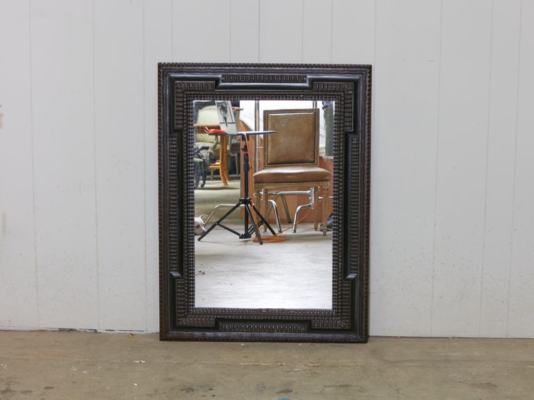 Dutch 19th Century Hand-Carved Mirror with Grooved Effects and Dark Patina For Sale at 1stDibs