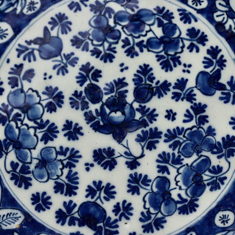Dutch Delft Plate with Floral Design, 18th Century For Sale at 1stDibs