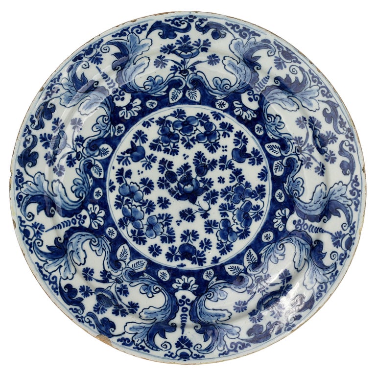 Dutch Delft Plate with Floral Design, 18th Century For Sale at 1stDibs