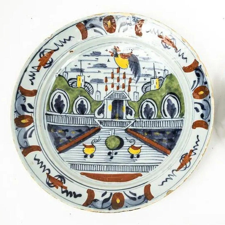 Dutch Delft Polychrome Plate with Garden Scene For Sale at 1stDibs