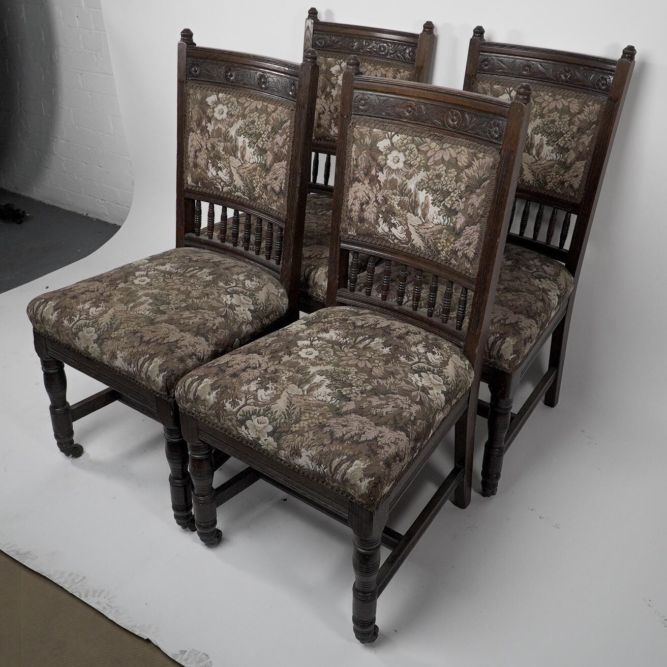 E W Godwin attributed, A set of four Aesthetic Movement oak dining ...