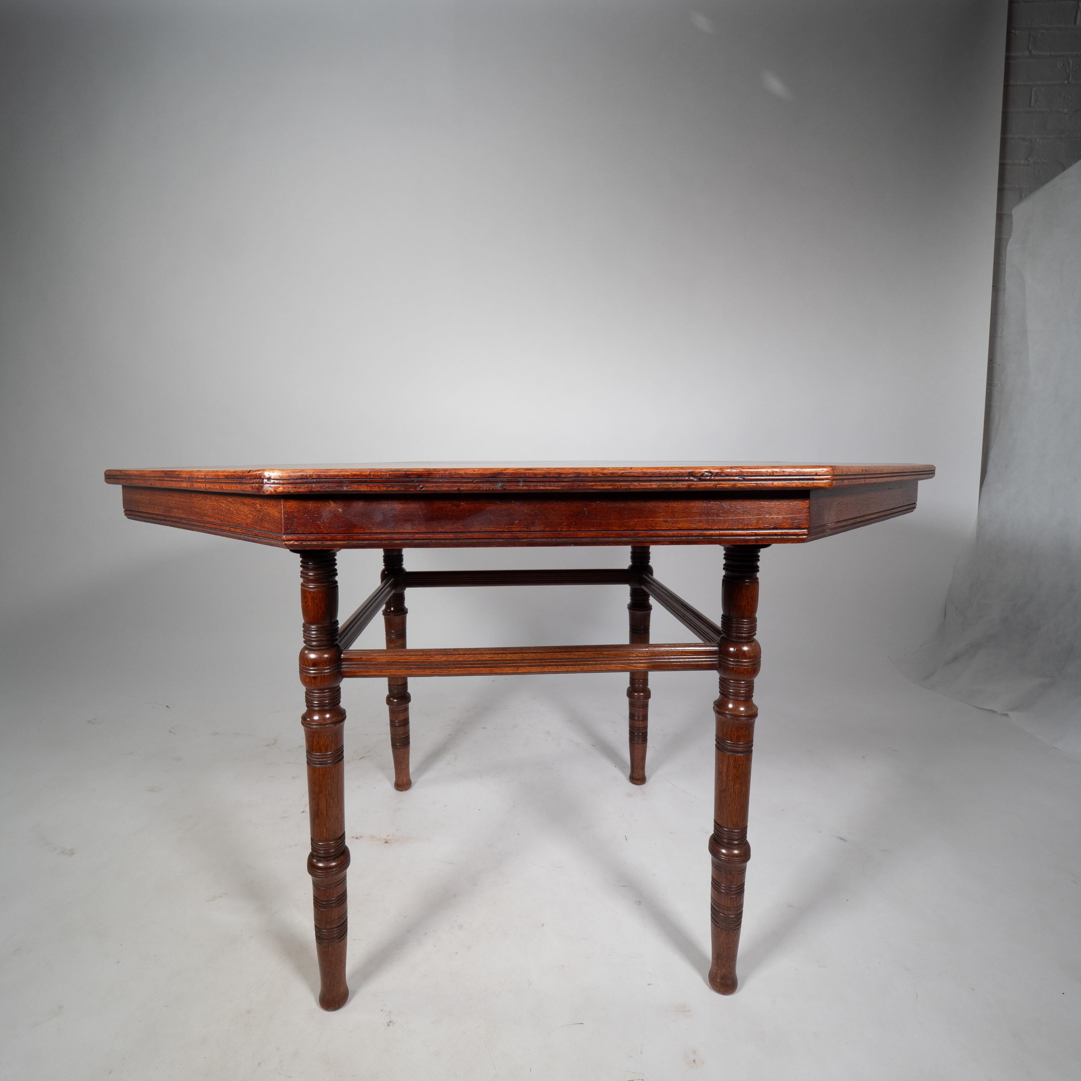 E W Godwin (style of). An Aesthetic Movement Walnut octagonal centre ...