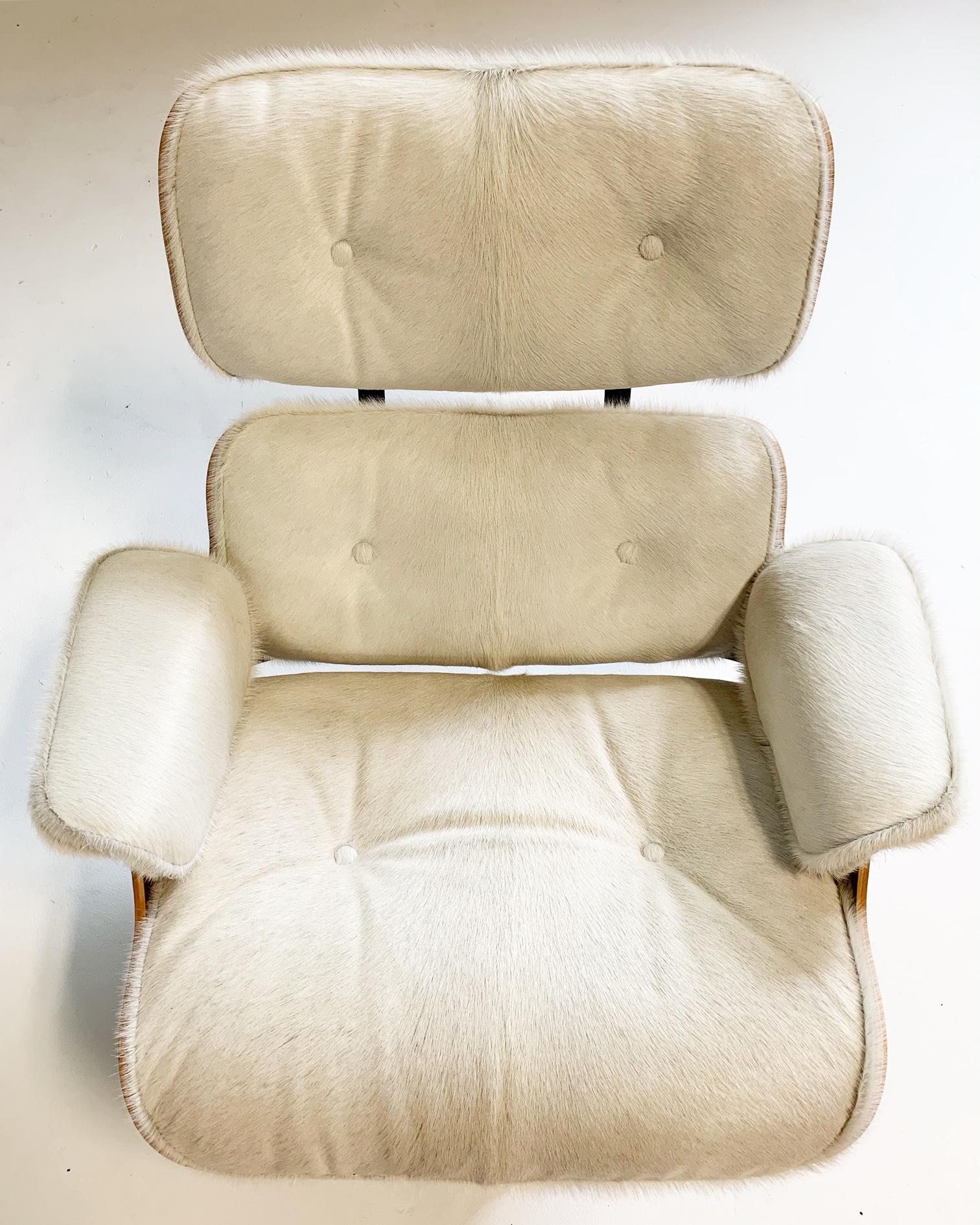 Eames 670 Lounge Chair and 671 Ottoman in Brazilian Cowhide at 1stDibs