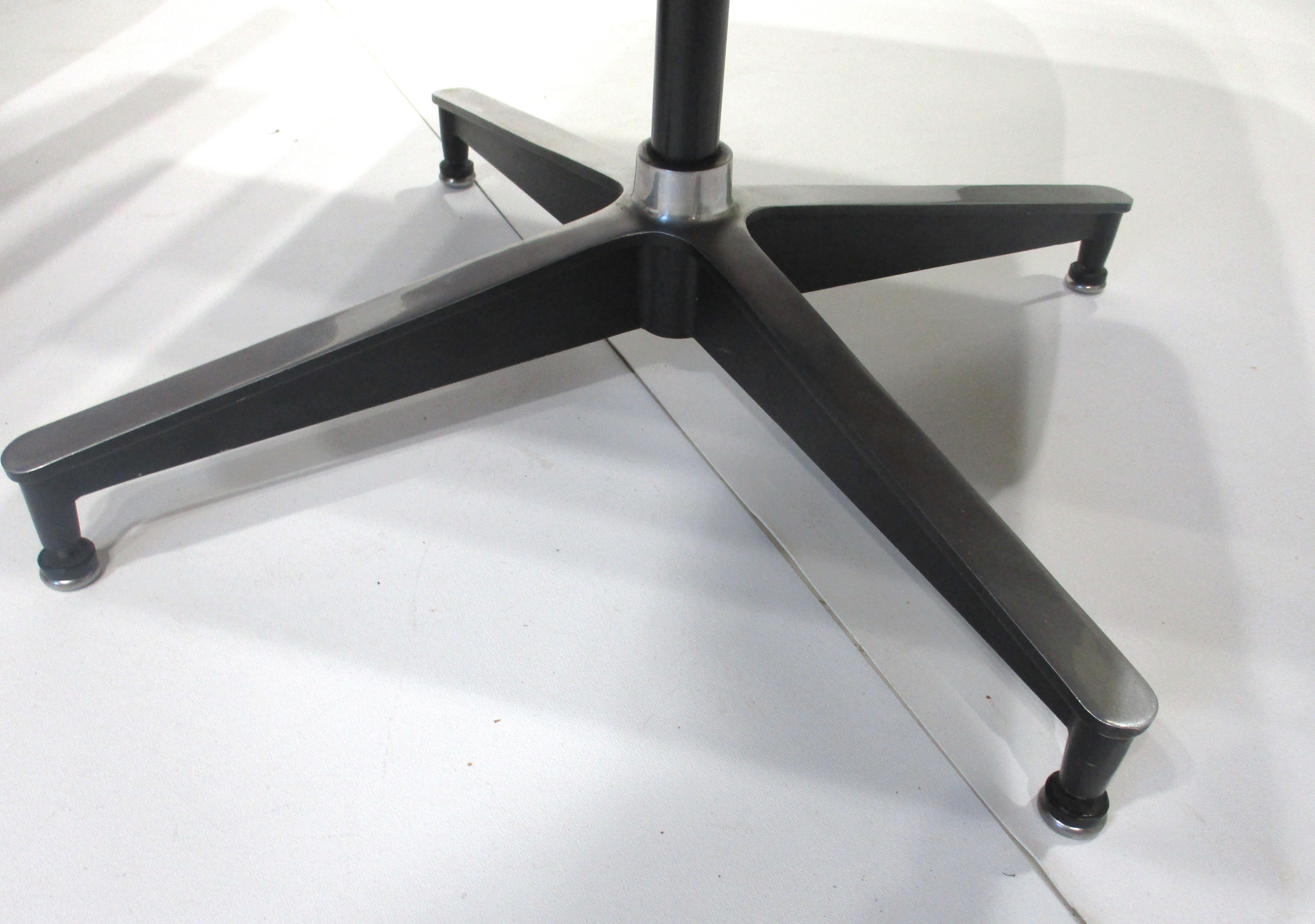 Eames 670 Rosewood Leather Lounge Chair with Ottoman at 1stDibs