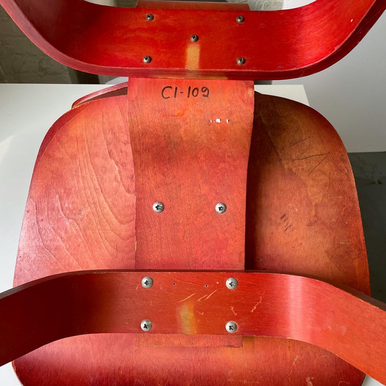 Eames DCW in Original Red Aniline Dye For Sale at 1stDibs