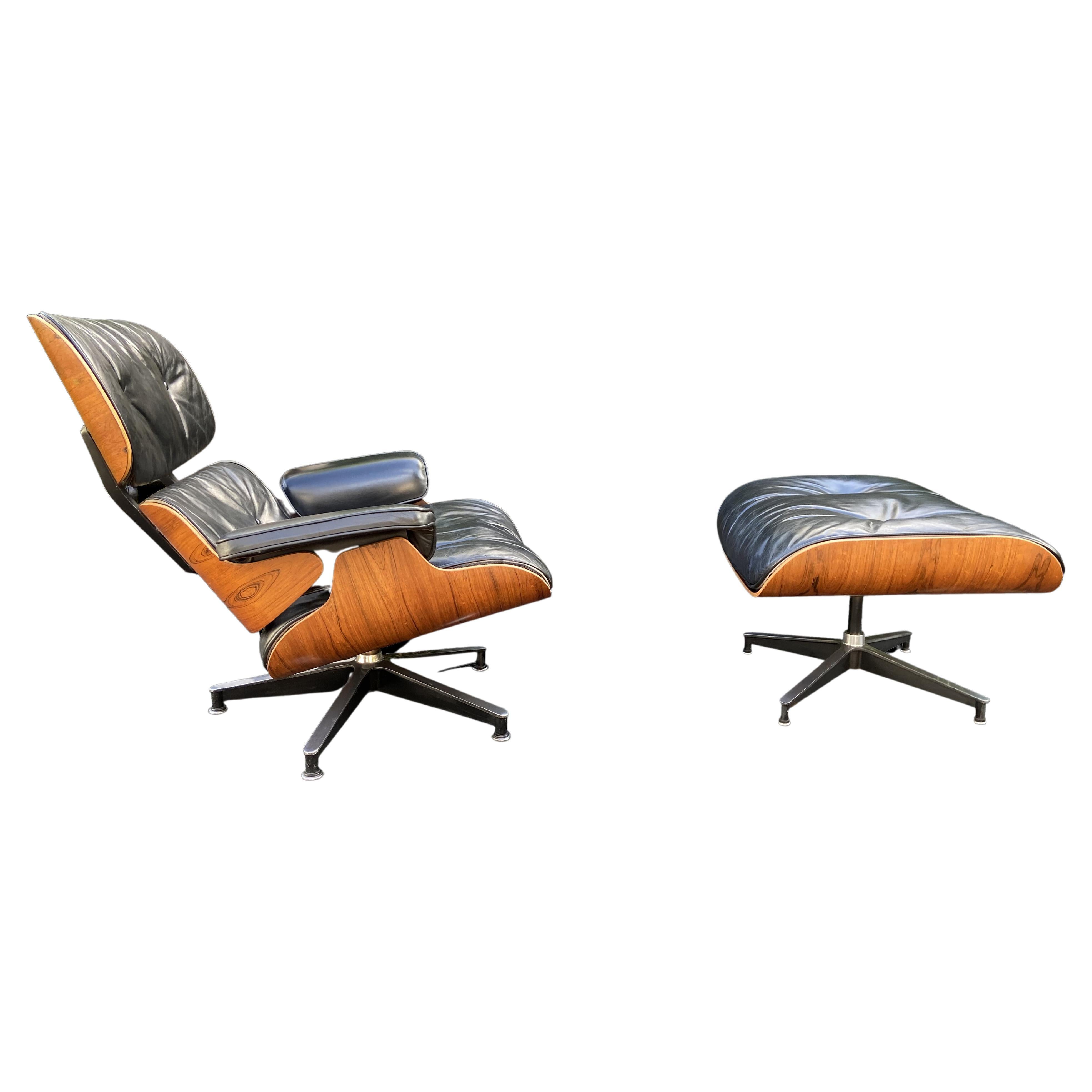 Eames Black Leather and Rio Rosewood Lounge Chair and Ottoman at 1stDibs