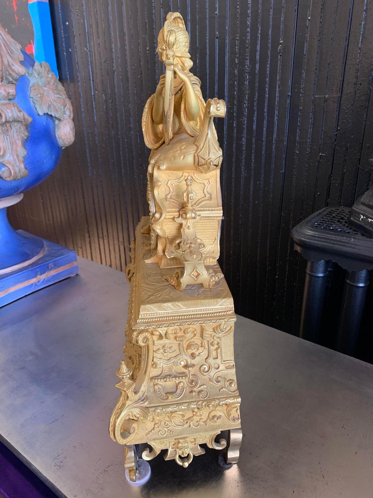 Early 19th Century French Gilt Figural Bronze Mantle Clock For Sale At