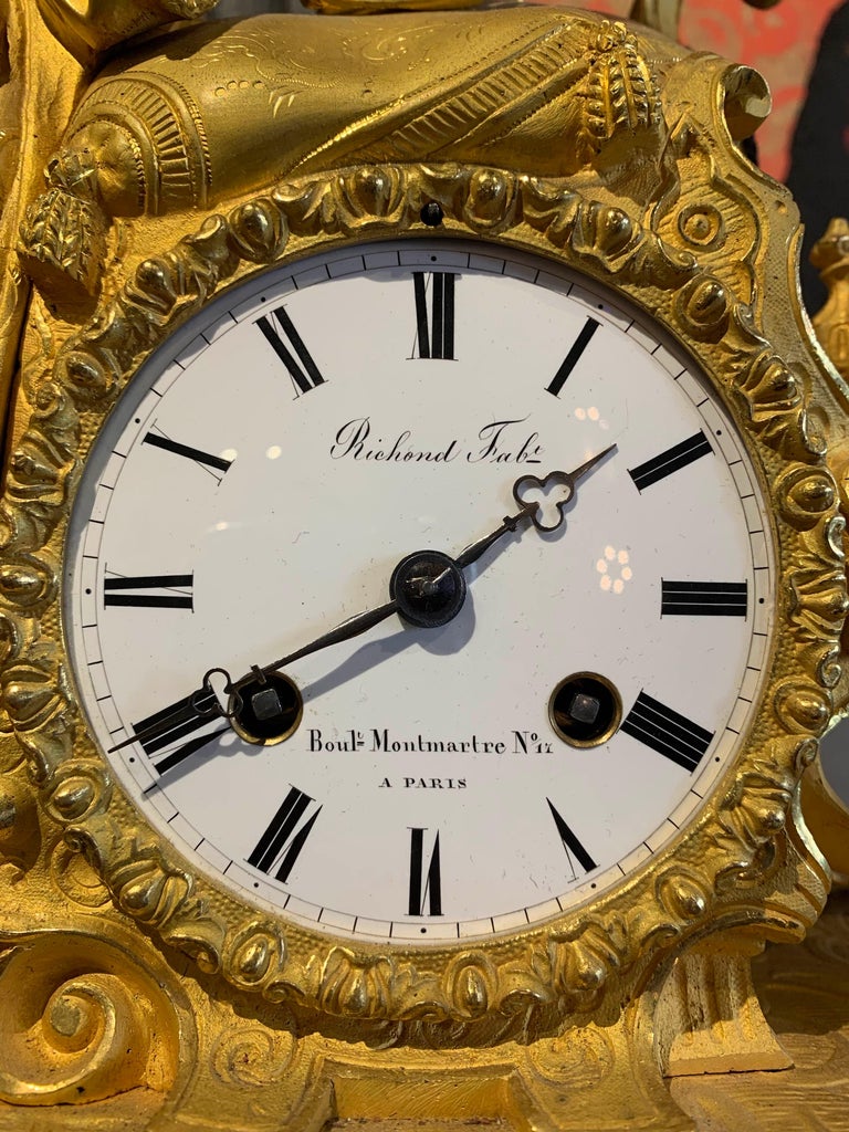 Early 19th Century French Gilt Figural Bronze Mantle Clock For Sale At