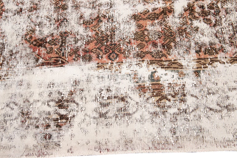 Early 20th Century Antique Distressed Wool Rug For Sale at 1stDibs