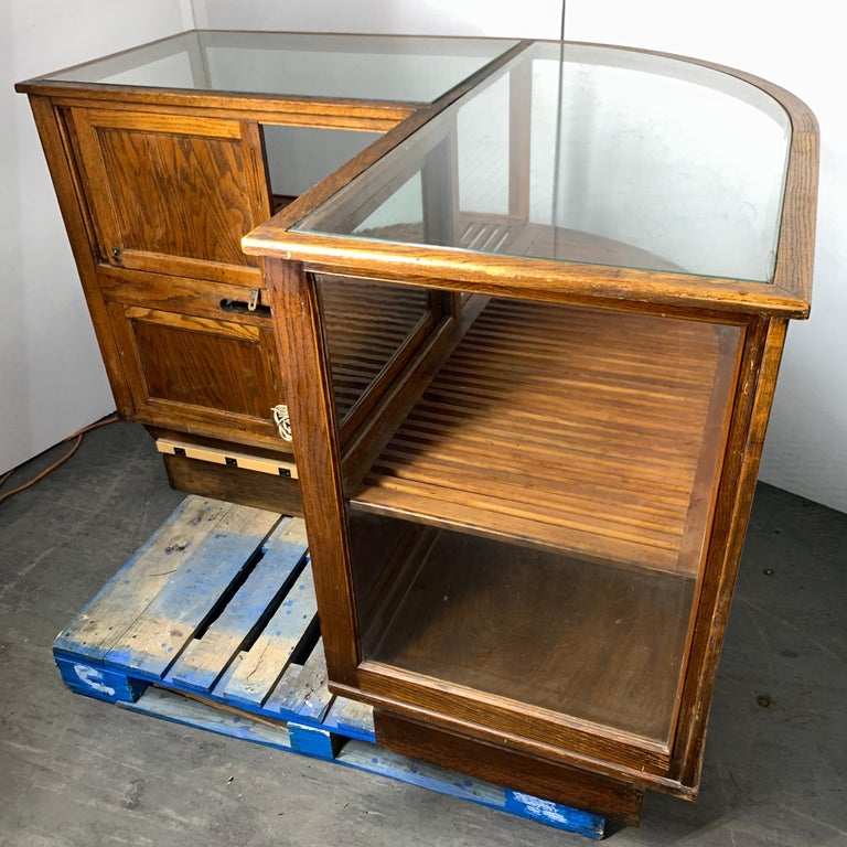 Early 20th Century Curved Corner Oak Two-Tier Display Cabinet at 1stDibs