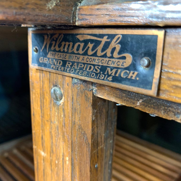 Early 20th Century Curved Corner Oak Two-Tier Display Cabinet at 1stDibs