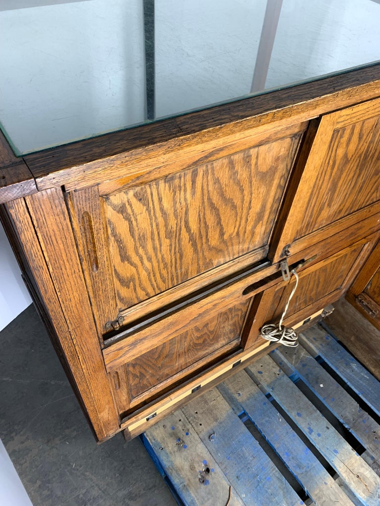 Early 20th Century Curved Corner Oak Two-Tier Display Cabinet at 1stDibs
