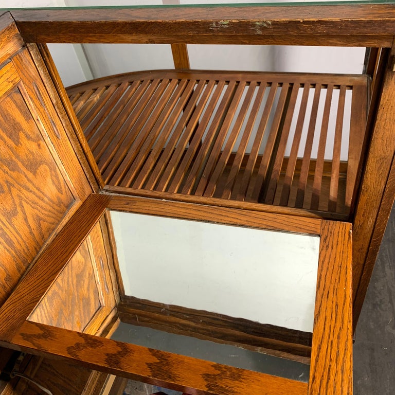 Early 20th Century Curved Corner Oak Two-Tier Display Cabinet at 1stDibs