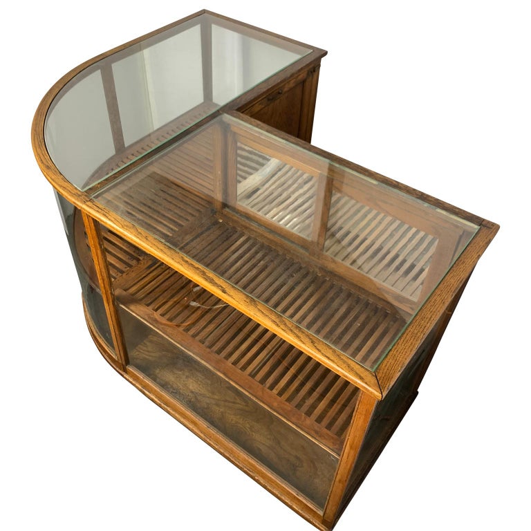Early 20th Century Curved Corner Oak Two-Tier Display Cabinet at 1stDibs