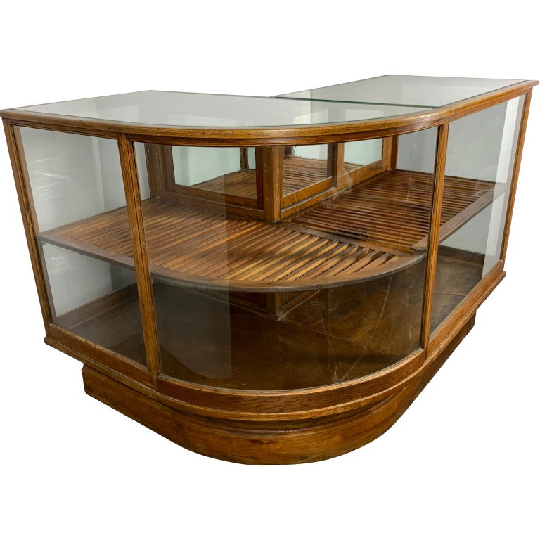 Early 20th Century Curved Corner Oak Two-Tier Display Cabinet at 1stDibs