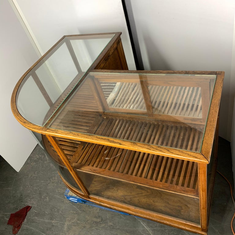 Early 20th Century Curved Corner Oak Two-Tier Display Cabinet at 1stDibs