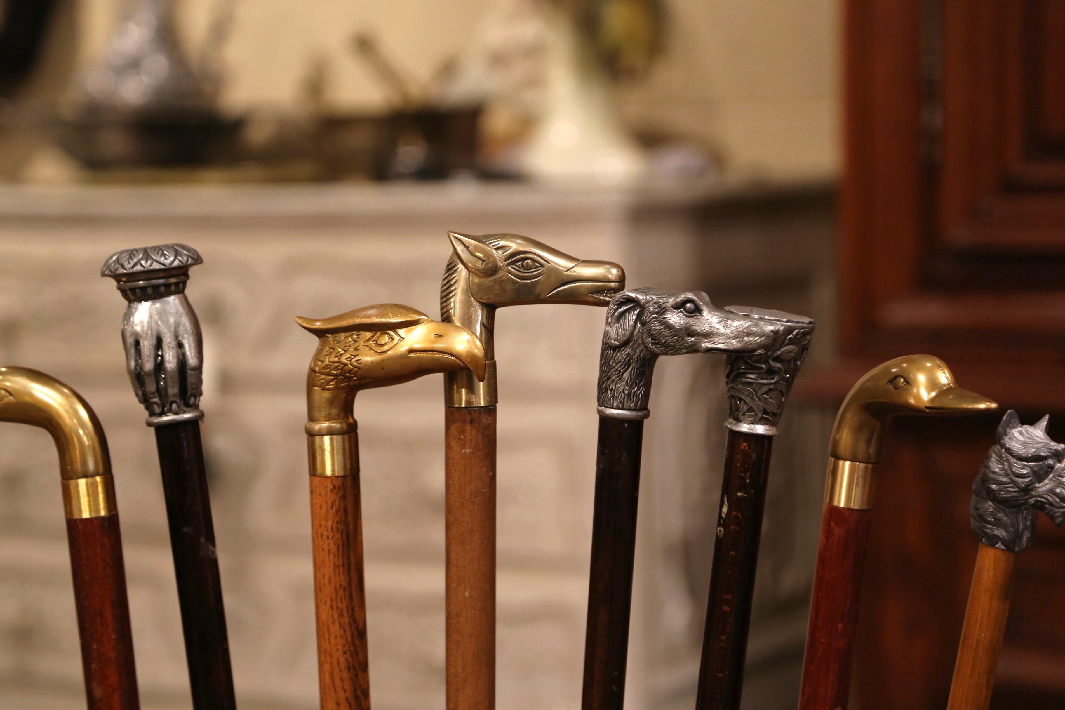 Early 20th Century French Carved Walnut Cane Stand with Eleven Antique ...