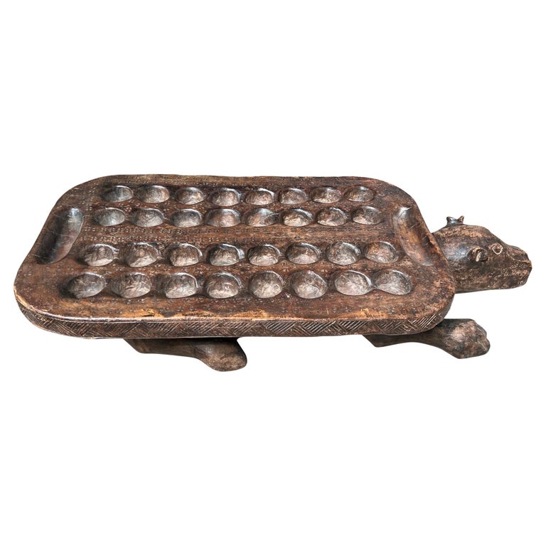 Early 20th Century Leopard Mancala Game Board For Sale at 1stDibs