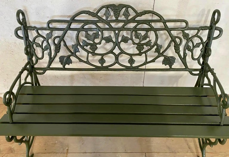 Early 20th Century Painted Cast Iron Garden Bench with Vine Motif For ...