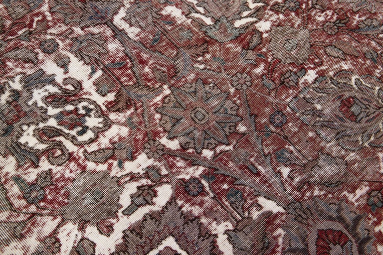 Vintage Handmade Distressed Persian Wool Rug In Red For Sale at 1stDibs