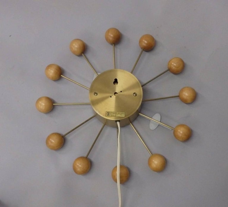 Early George Nelson Associates Howard Miller Blonde Ball Clock at 1stDibs