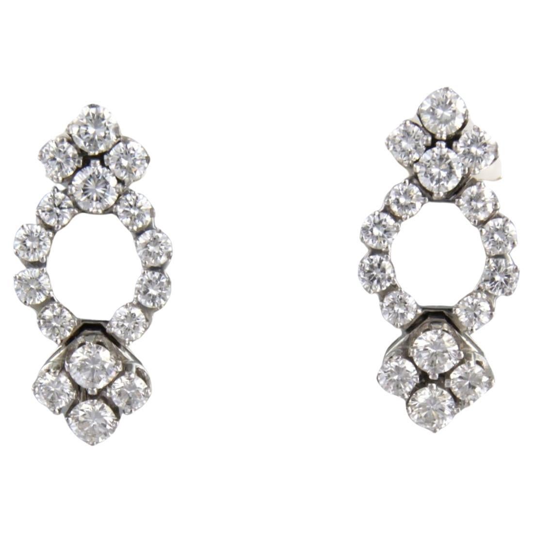 Solitaire Stud earrings set with diamond 18k white gold For Sale at 1stDibs
